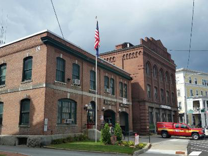 The red brick exterior gives off serious "important building" vibes without being pretentious about it, like a well-dressed person who doesn't need to tell you they're well-dressed.