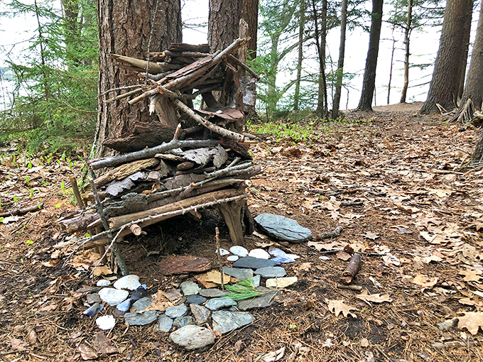 Autumn leaves decorate this seasonal fairy dwelling, the golden oak leaf serving as both roof and seasonal decoration.
