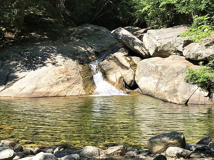 Tranquility in motion: where rushing water meets still pools, creating nature's own version of a luxury infinity edge design.