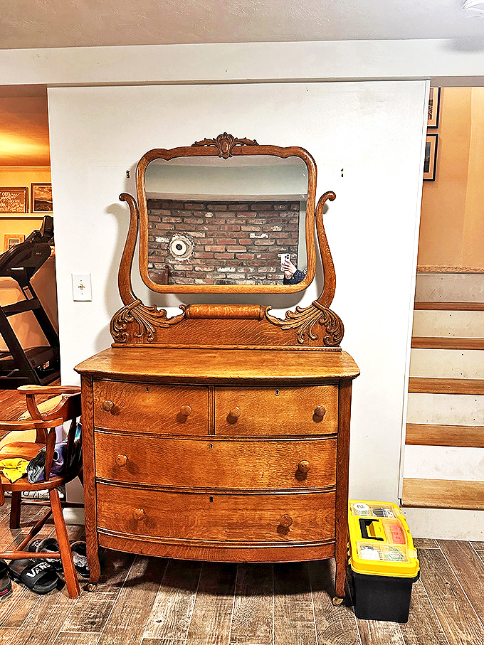 This oak dresser isn't just furniture; it's a time portal with drawers. Imagine the secrets it's kept and the faces it's reflected over decades.