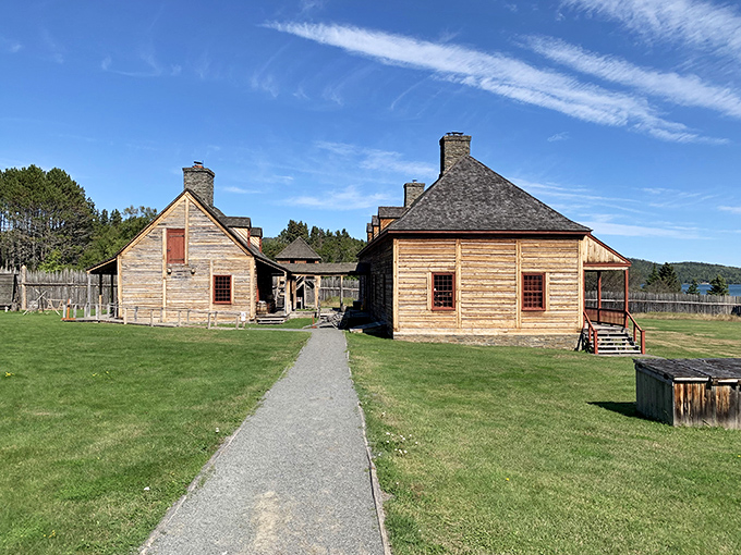 Grand Portage National Monument whispers stories of fur traders and Ojibwe partnerships through its meticulously reconstructed wooden buildings.