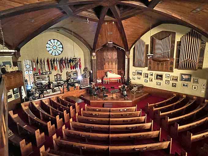 The Hanni Strahl Concert Hall preserves the church's original sanctuary, where wooden pews now seat audiences for accordion performances beneath soaring ceilings.