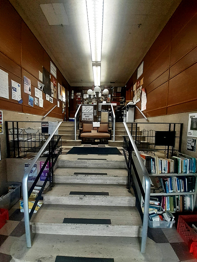 Those stairs lead to more books than you could read in several lifetimes, which sounds like a challenge worth accepting immediately.