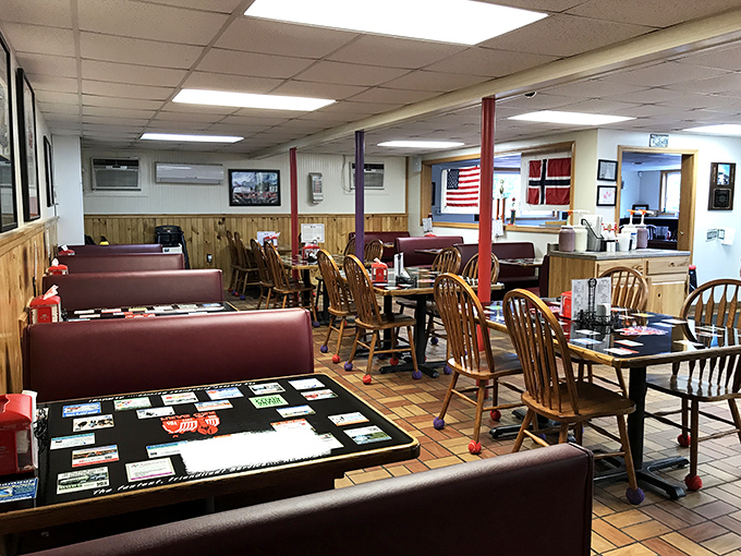 Cozy booths and wooden paneling create that classic Maine dining atmosphere – unpretentious and ready for serious eating.