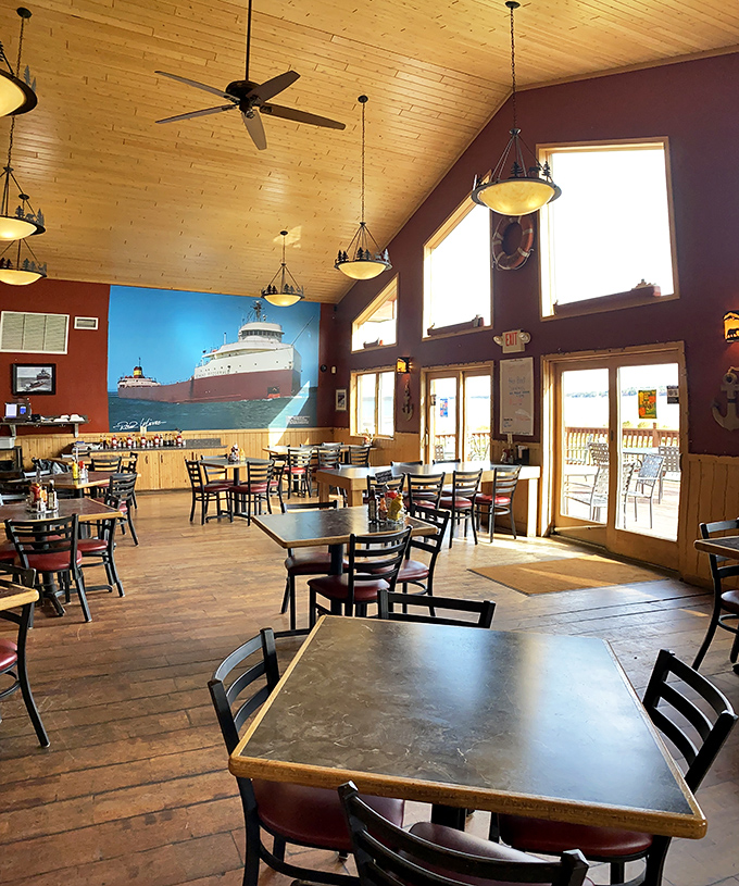 The dining area's soaring wood ceiling and freighter mural create that "I've discovered something special" feeling – like stumbling upon your favorite uncle's secret cabin getaway.