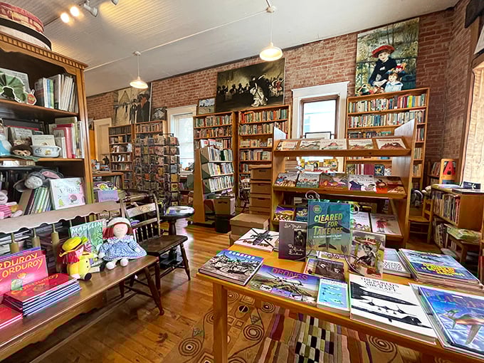 Wooden shelves stretch toward the ceiling, creating a warm labyrinth of literary treasures where time seems to slow to the pace of a good story.