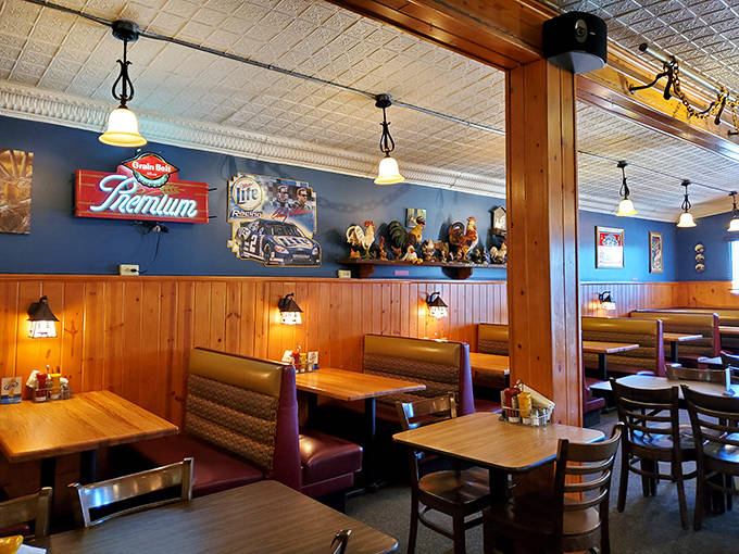 Cozy booths and warm wood paneling create the perfect backdrop for what locals know will be an unforgettable meal.