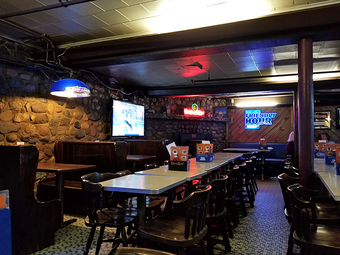 Step inside to discover a cozy den of wood paneling and neon signs – the perfect backdrop for pizza perfection.