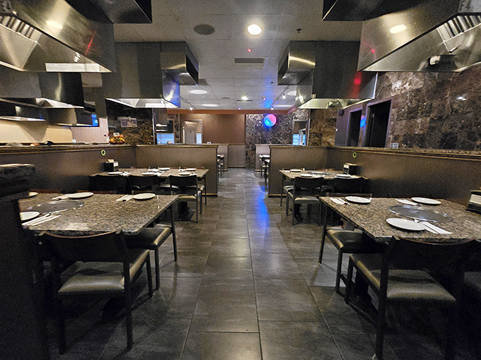 Sleek granite tables and modern lighting create an atmosphere that's both sophisticated and welcoming &ndash; fancy enough for date night, casual enough for Tuesday.