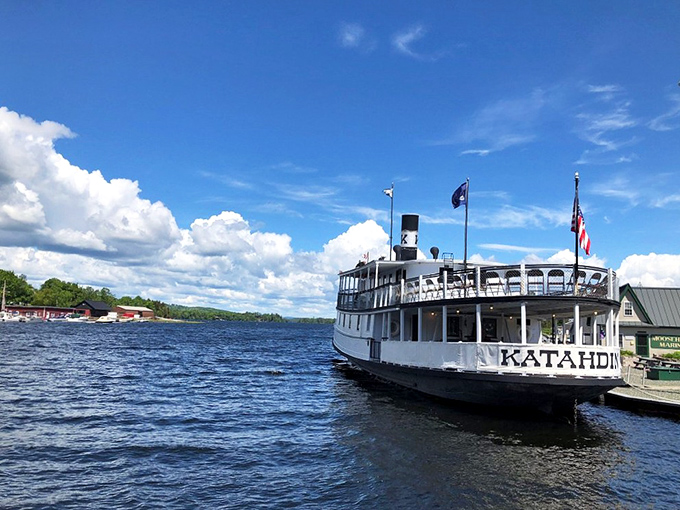 The historic Katahdin steamboat glides across Moosehead's waters, carrying stories from Maine's logging past while creating new memories for today's adventurers.