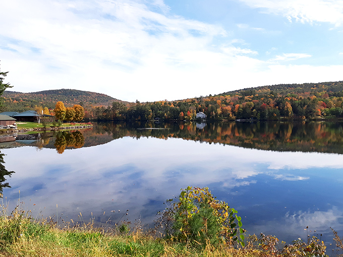 Mirror-perfect reflections double the visual feast of Vermont's fall foliage, creating a symmetrical masterpiece that no filter could improve.