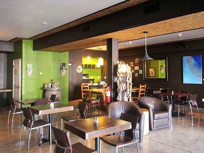 Inside, warm colors and comfortable seating create the perfect atmosphere for lingering over breakfast or lunch without feeling rushed.