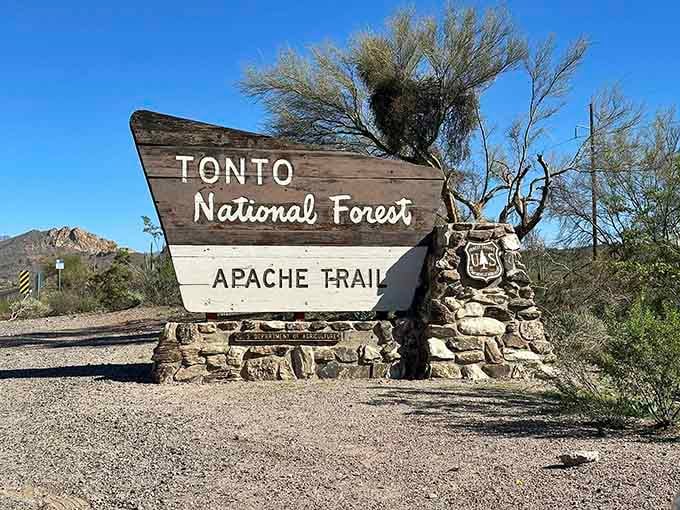 The Apache Trail sign welcomes adventurers to one of Arizona's most scenic and slightly terrifying drives through Tonto National Forest.