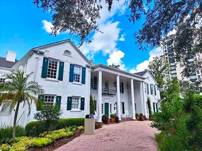 Selby House stands as a stately reminder of the garden's history, its white columns and green shutters framing Florida's botanical legacy.