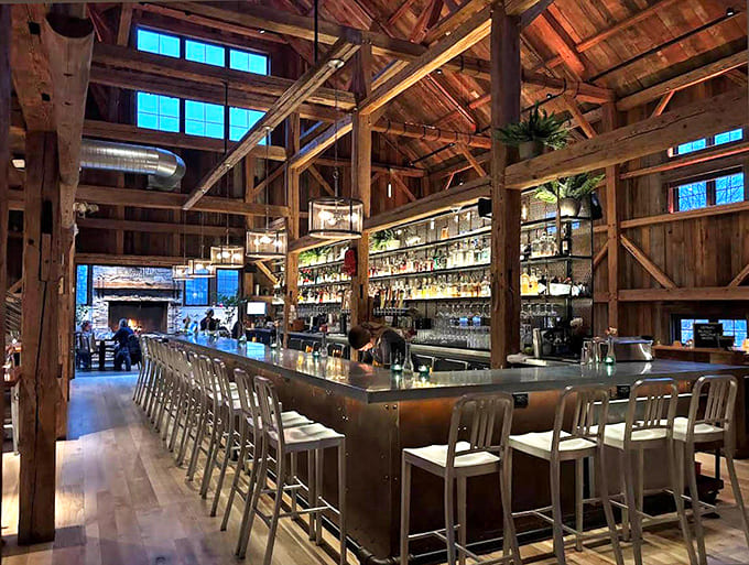 Those soaring timber beams and modern touches create a space where history and contemporary design shake hands and become best friends.