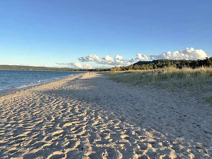 Wide, sandy beaches stretch for miles along Lake Michigan's shoreline, offering plenty of space for sandcastles, sunbathing, and splashing in crystal-clear waters.
