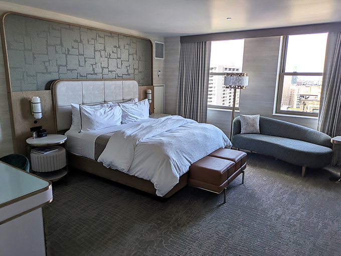 Sink into cloud-like comfort in rooms that blend historic charm with modern luxury &ndash; the perfect urban sanctuary after exploring Detroit.