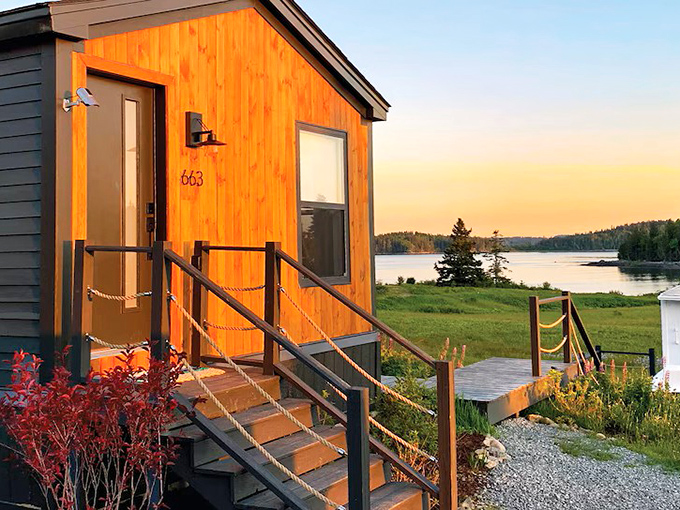 Sunset splendor at cabin #663, where the golden hour transforms this wooden retreat into a coastal dream home.