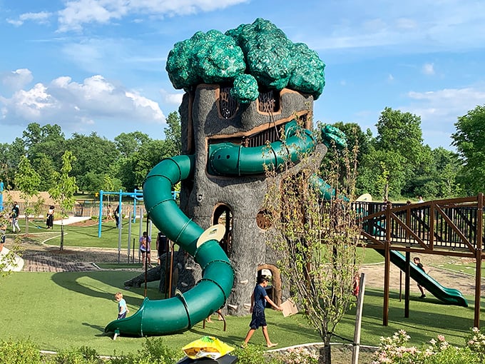 Not your average treehouse! This custom play structure combines whimsical design with accessibility, complete with twisting slides for quick escapes.