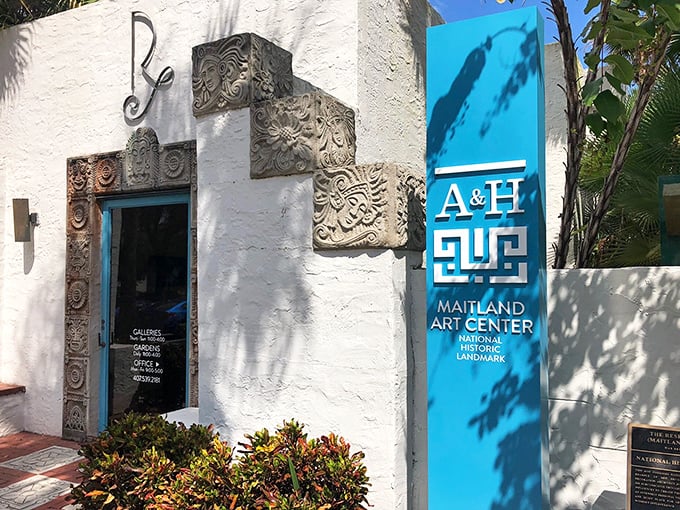 Intricate Mayan-inspired details frame the entrance, like ancient whispers carved in concrete &ndash; Florida's most unexpected architectural treasure.