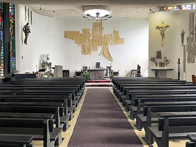Inside the monastery chapel, modern design elements blend with traditional religious iconography, creating a space that feels both timeless and contemporary.