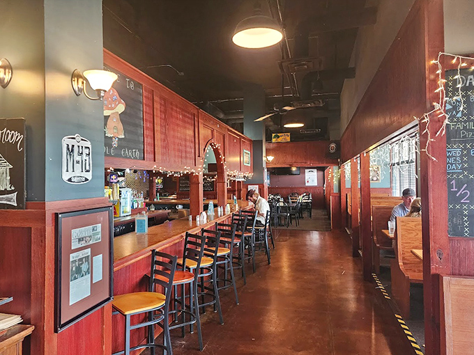 The warm wooden interior invites guests to linger, with cozy bar seating that would make any hobbit feel right at home.