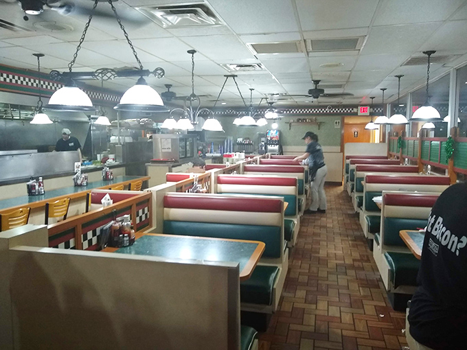Classic diner charm meets comfort food heaven inside Tony's, where red vinyl booths and checkered trim set the stage for epic meals.
