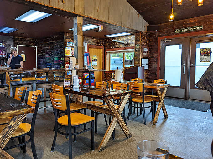 Rustic charm meets practical comfort in this interior where wood accents and simple decor create the perfect stage for barbecue's starring role.