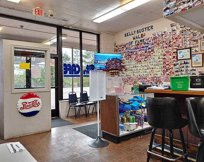 The legendary "Bellybuster Hall of Fame" wall showcases brave souls who've conquered the mountain of meat that is Big Daddy's signature challenge.