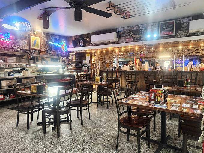 Dollar bills and fishing memorabilia create a tapestry of memories inside Cherry Pocket, where every surface tells a story.