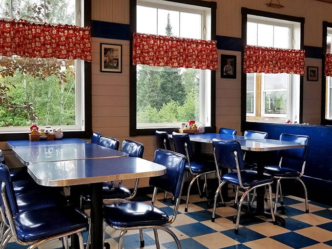 Step back in time with classic blue vinyl booths and checkerboard floors &ndash; comfort never goes out of style.
