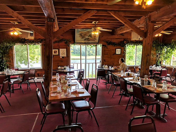 Rustic wooden beams frame the dining experience, creating a cozy cabin feel that makes every meal feel like a woodland retreat with chopsticks.