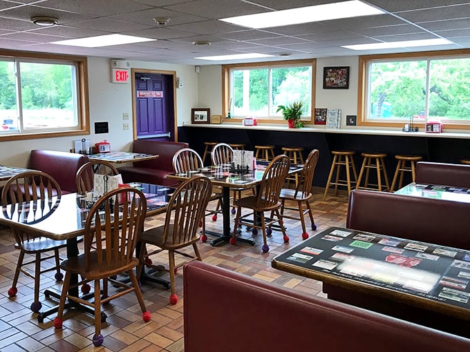 Inside The Red Barn, wooden chairs and cozy booths await hungry patrons. This isn't fancy dining&mdash;it's comfort incarnate with a side of Maine hospitality.
