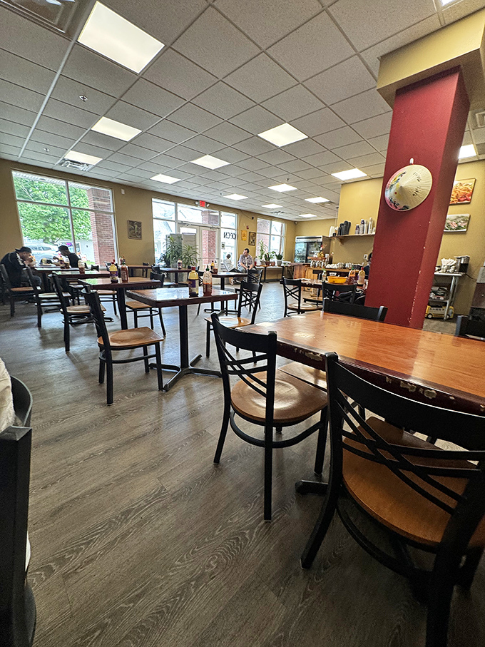 Simple wooden tables and warm yellow walls create an unpretentious dining space where the spectacular food takes center stage.