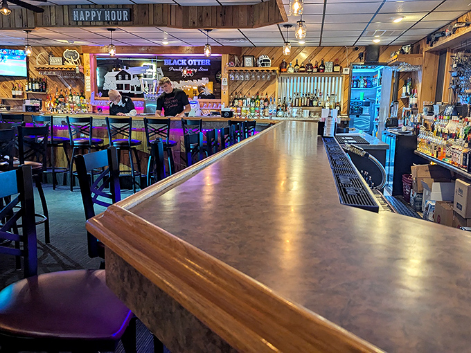 Step inside to discover gleaming wood surfaces and a bar that stretches toward infinity, Wisconsin style, where Old Fashioneds flow freely.