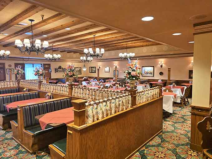 Warm wooden beams, cozy booths, and traditional decor create an authentic atmosphere that wraps around diners like a warm pretzel hug.