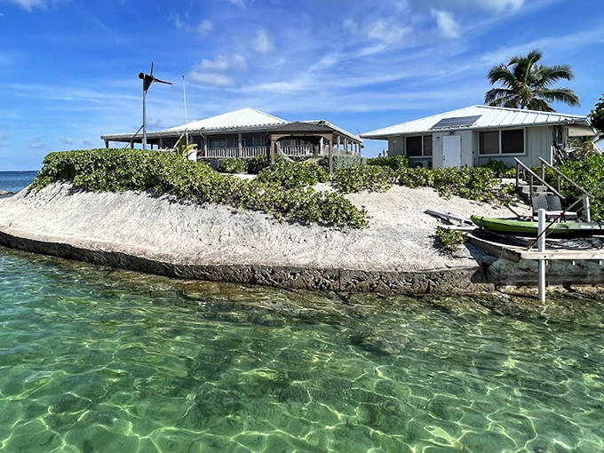 Island living redefined: Where coral stone walls embrace crystal waters, creating nature's perfect swimming lagoon around your temporary kingdom.