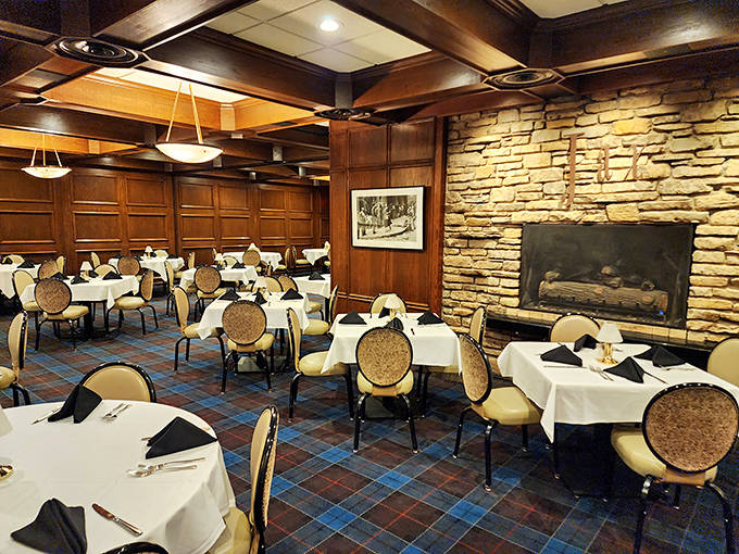 Interior: Rich wood paneling, white tablecloths, and stone accents create the perfect backdrop for memorable meals&mdash;like dining in a warm, sophisticated time capsule.