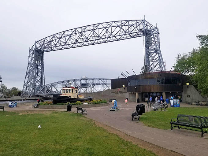The iconic Aerial Lift Bridge stands tall near the Maritime Visitor Center, where ships pass through this engineering marvel on their journey into Duluth's harbor.