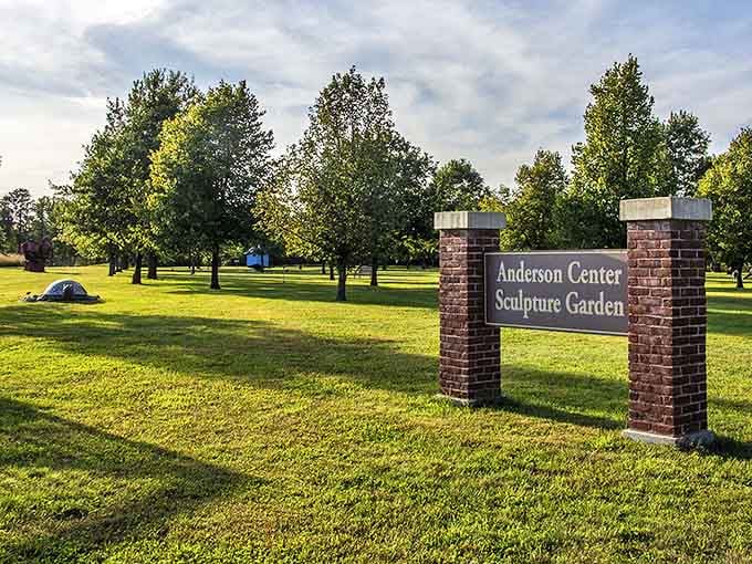 Anderson Center's entrance welcomes art lovers with its brick pillars and green expanse, promising creative discoveries beyond.