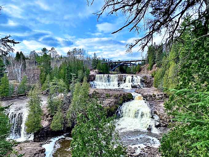 Gooseberry Falls cascades dramatically over ancient rock formations, creating nature's perfect staircase of rushing water.