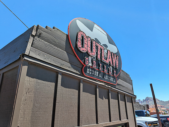 Outlaw Grille's bold sign announces its presence in Sedona, where BBQ meets the majesty of red rock country.