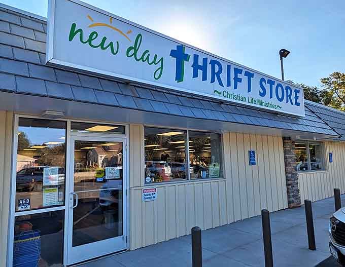 The bright, welcoming sign of New Day Thrift Store invites shoppers to discover quality second-hand items while supporting Christian Life Ministries.