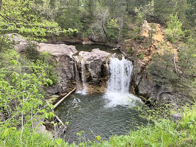 The peaceful pool beneath Ramsey Falls invites contemplation &ndash; nature's own meditation space hidden in southern Minnesota.