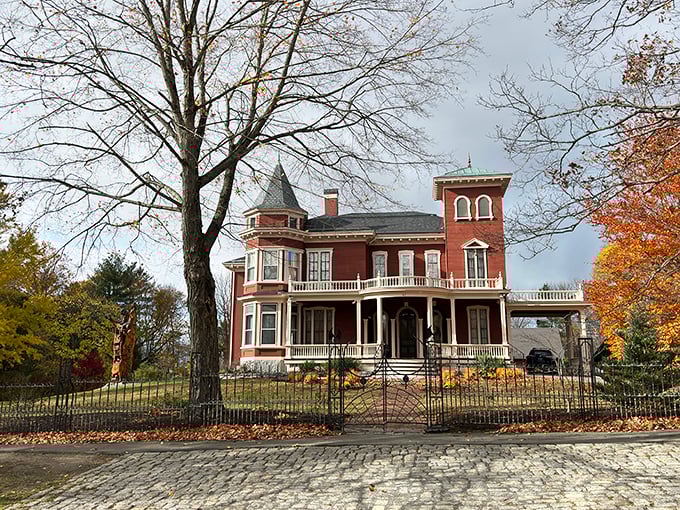 The wrought-iron fence surrounding King's former home features bat and spider web designs &ndash; subtle hints at the nightmares created within.