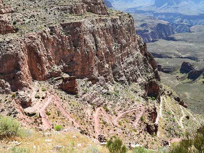 Looking down through the bridge planks at the Colorado River is like checking your pulse, thrilling and slightly terrifying.