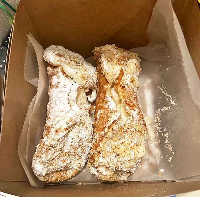 These aren't just cannoli – they're crispy, creamy masterpieces that have ruined lesser cannoli for generations of Michigan dessert lovers.