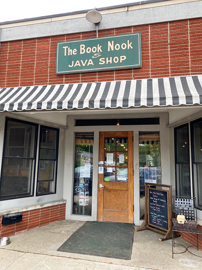 That wooden door isn't just an entrance &ndash; it's a portal to a world where books and beverages create the perfect escape.