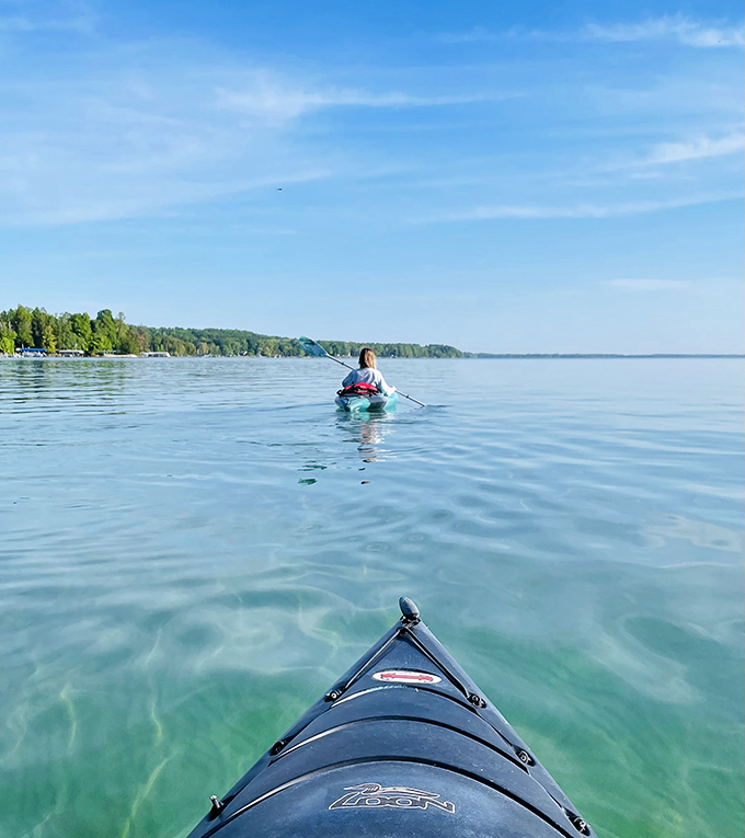 Gliding across glass A peaceful morning paddle reveals why kayaking on Elk Lake feels like floating on liquid crystal.
