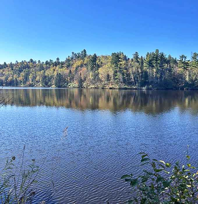 Mirror-like waters reflect the untouched wilderness surrounding this pristine lake&mdash;the same tranquil view that greeted voyageurs centuries ago.